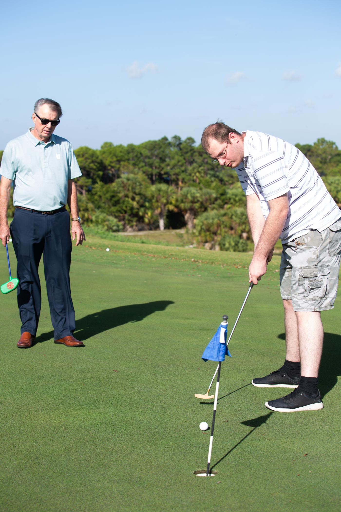 GL Homes hosts golf outing for developmentally disabled adults ...
